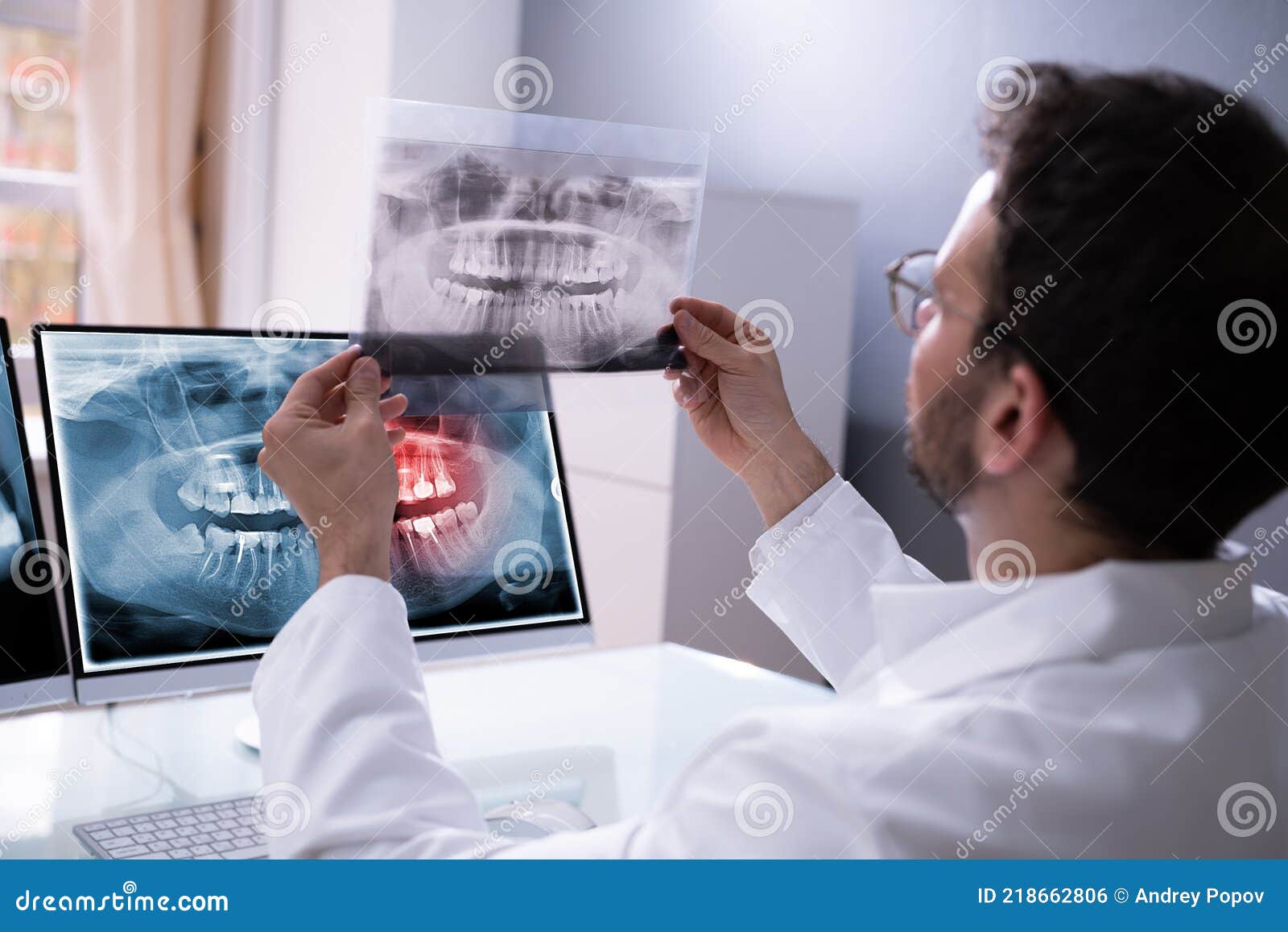 Dentist Using Occlusal Spray On Fixed Denture Royalty-Free Stock ...