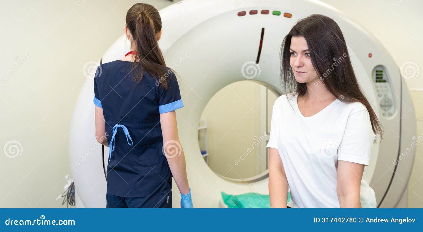 Radiologist with a Female Patient in the Room of Computed Tomography ...