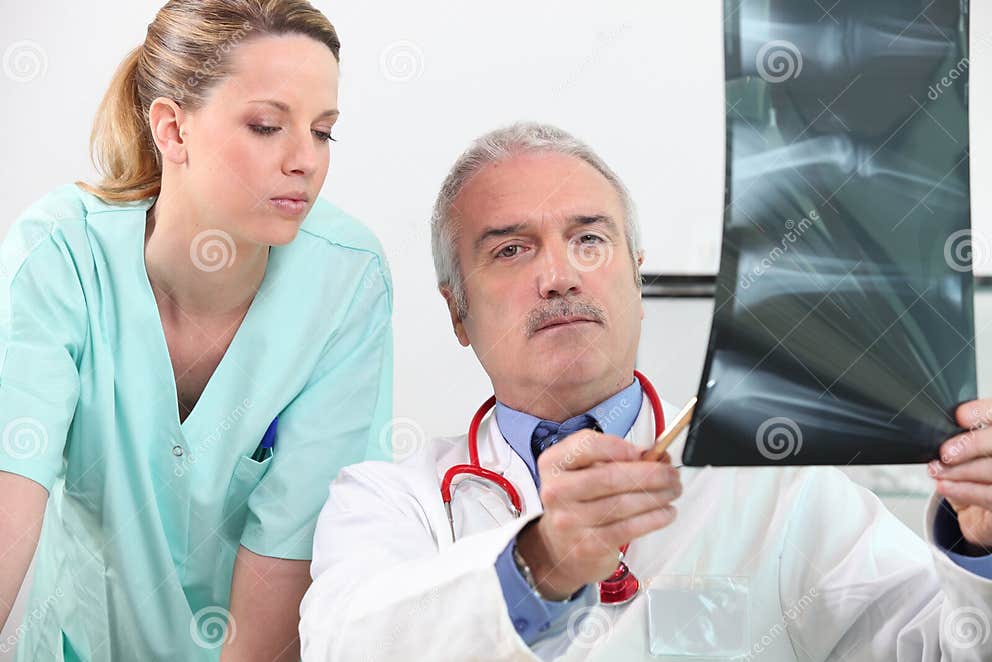 Radiologist and His Assistant Stock Image - Image of advice, effects ...