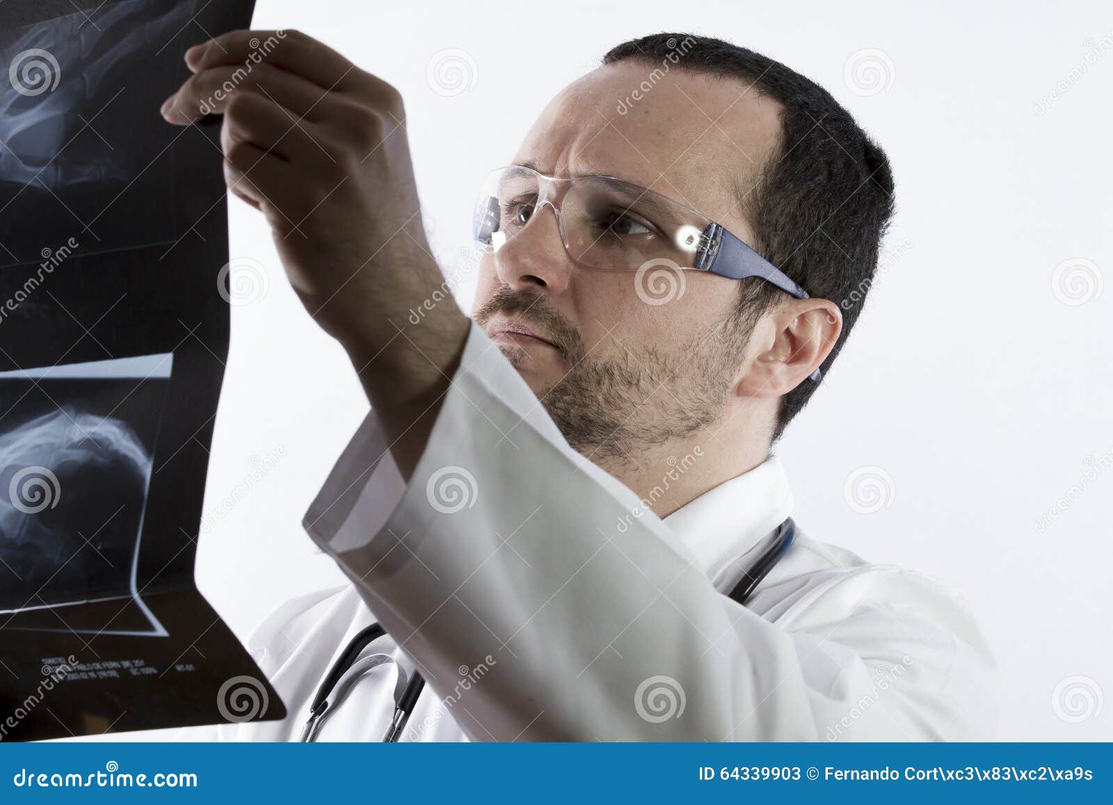 Radiologist Looking at an X-ray in Hospital Stock Image - Image of ...