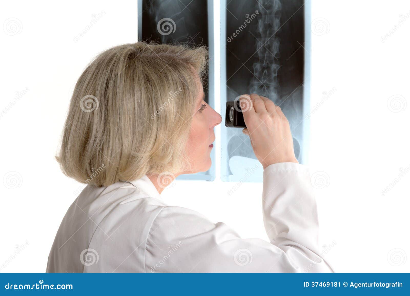 Radiologist with Magnifying Glass and X-rays Stock Image - Image of ...