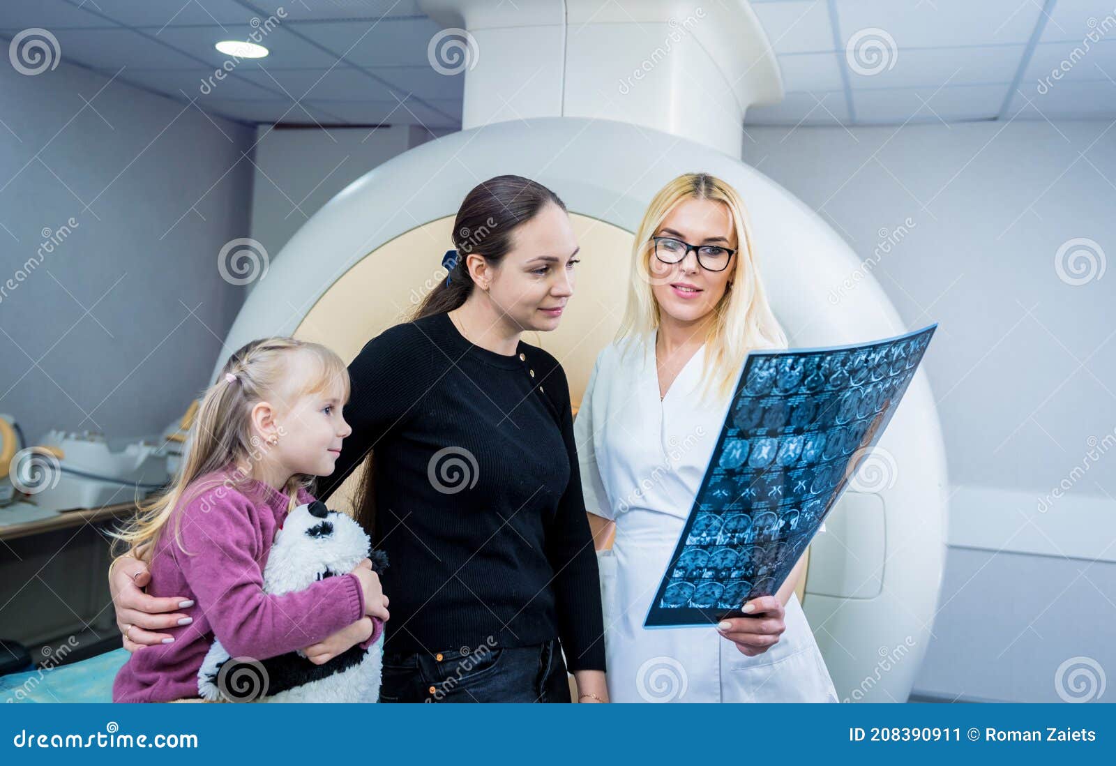 Radiologist with a Patients Examining a Mri Scan Stock Image - Image of ...