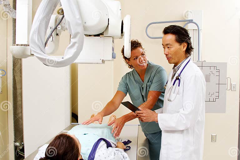 Radiologist and Technician Talking with Patient Stock Image - Image of ...