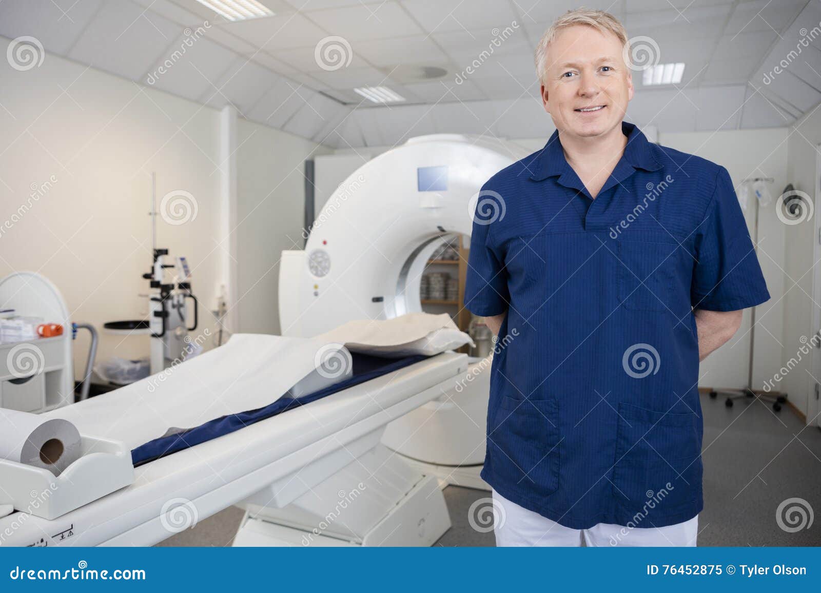 Radiologist in Uniform Standing by MRI Machine Stock Image - Image of ...