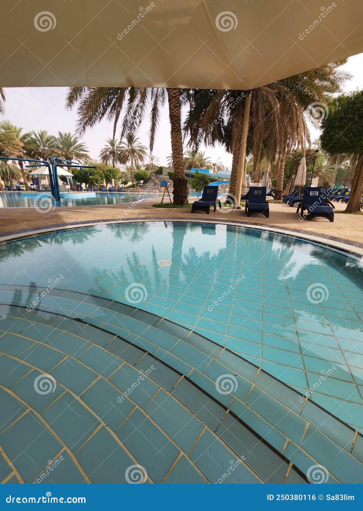 Radisson Blu Al Ain pools editorial photo. Image of walkway - 250380116