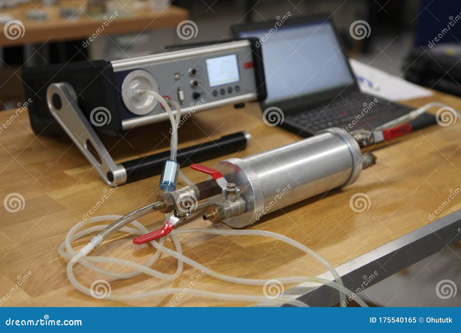 Radon Gas Radiation Detectors Testing Dosimetrist Holding A Portable Gamma Radiation Dosimeter