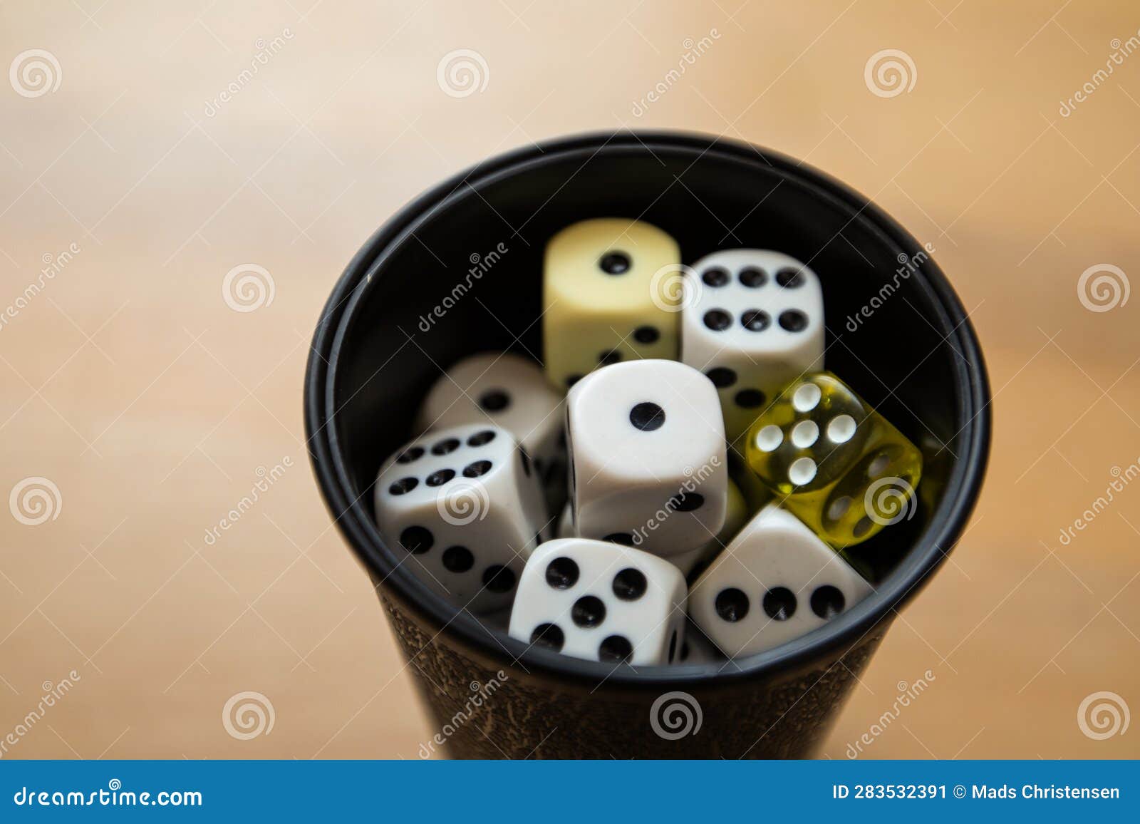 Raffle Cup Pebble Cup Filled with Dices of Different Kinds Stock Image ...