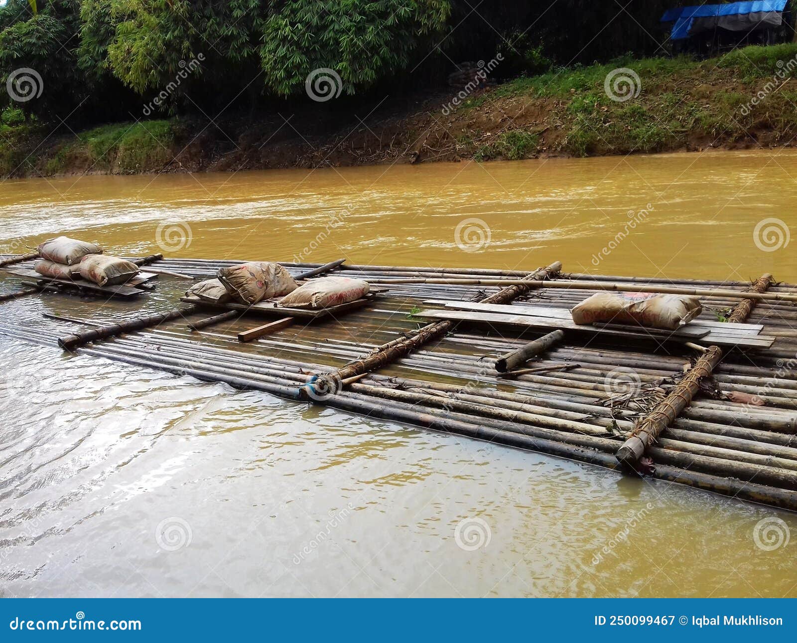 Raft across the river stock image. Image of river, brown - 250099467