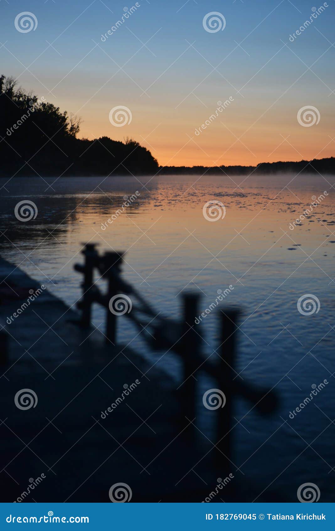 Raft on the river at dusk stock image. Image of night - 182769045