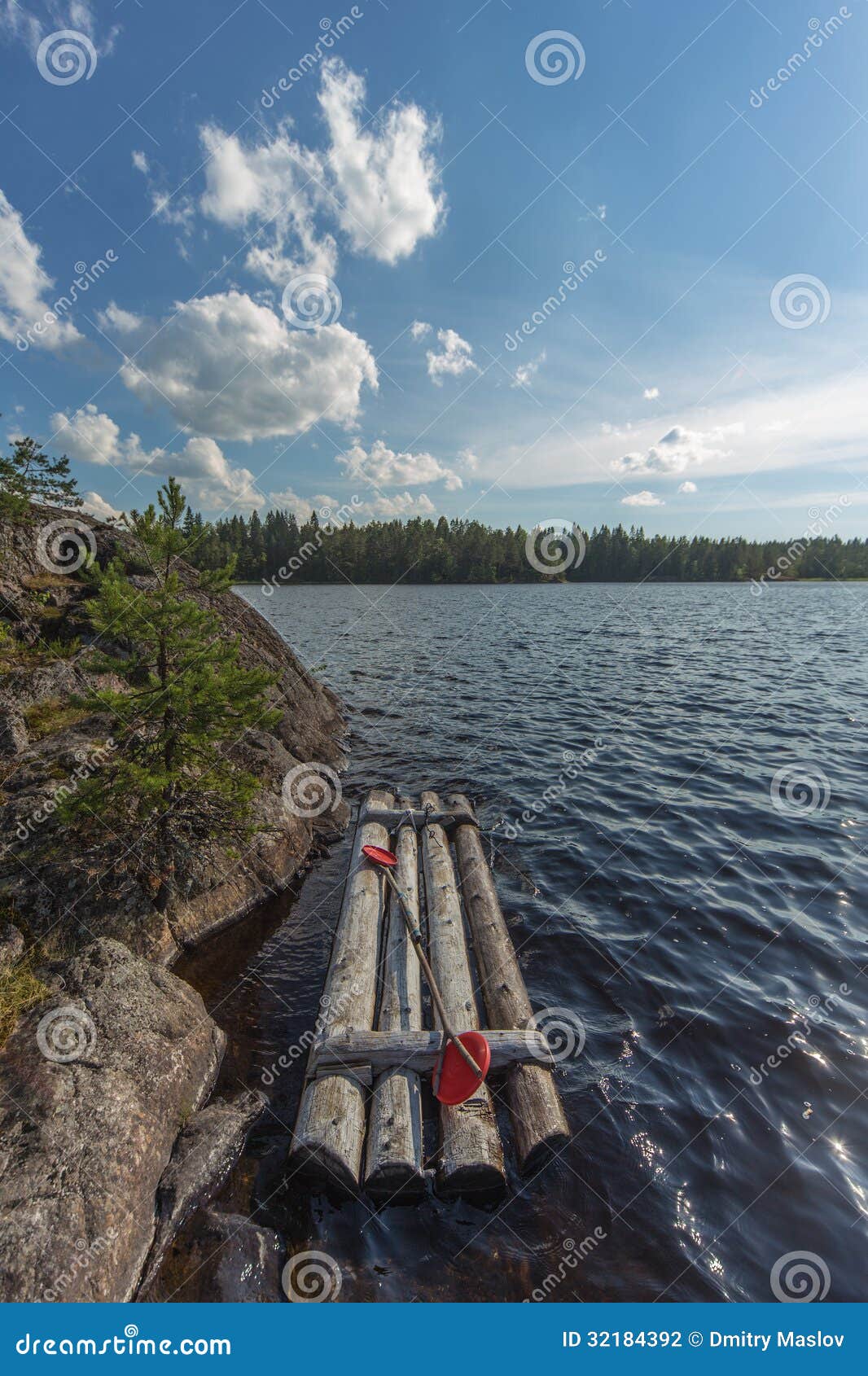 Raft at the rocky shore stock photo. Image of lake, beauty - 32184392