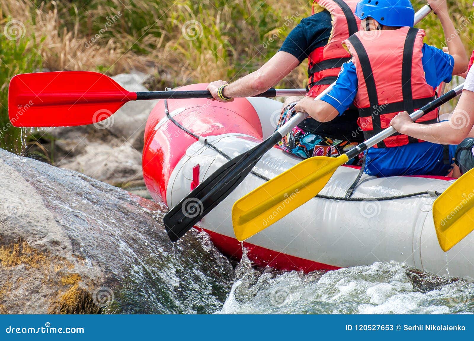 Rafting. Overcoming Obstacles. Close-up View of Oars with Splashing ...