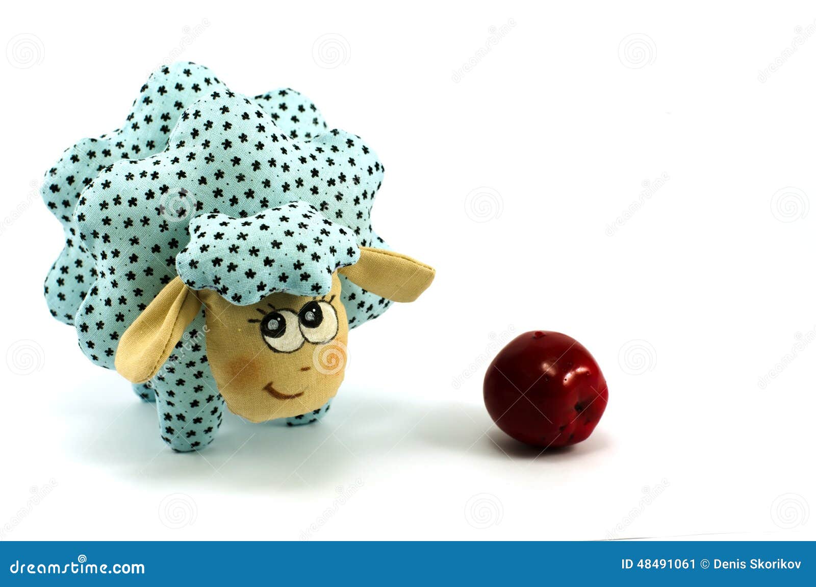 Rag-doll Turquoise Speckled Lamb with Red Apple on White Background ...