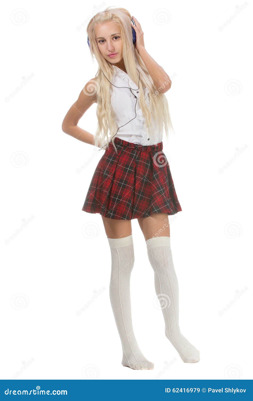 Ragazza Bionda Sexy Adorabile In Minigonna A Quadretti Con Le Cuffie