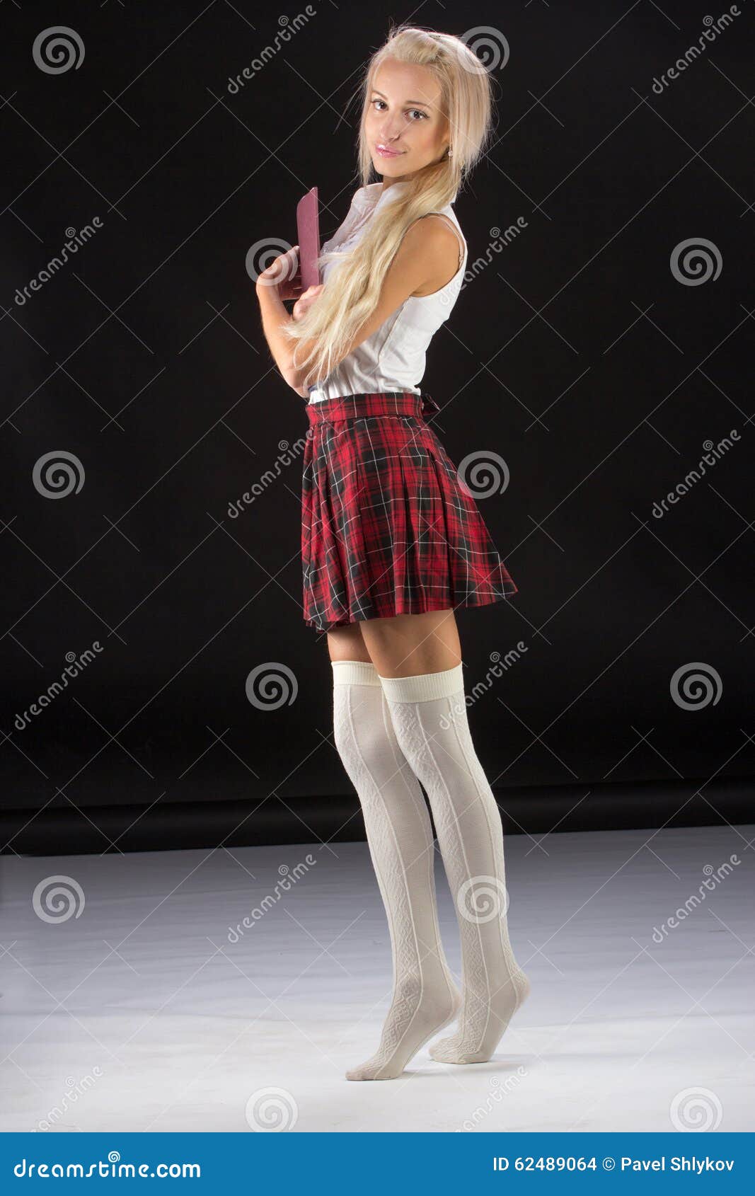 Ragazza Sexy Adorabile In Minigonna Del Plaid Fotografia Stock