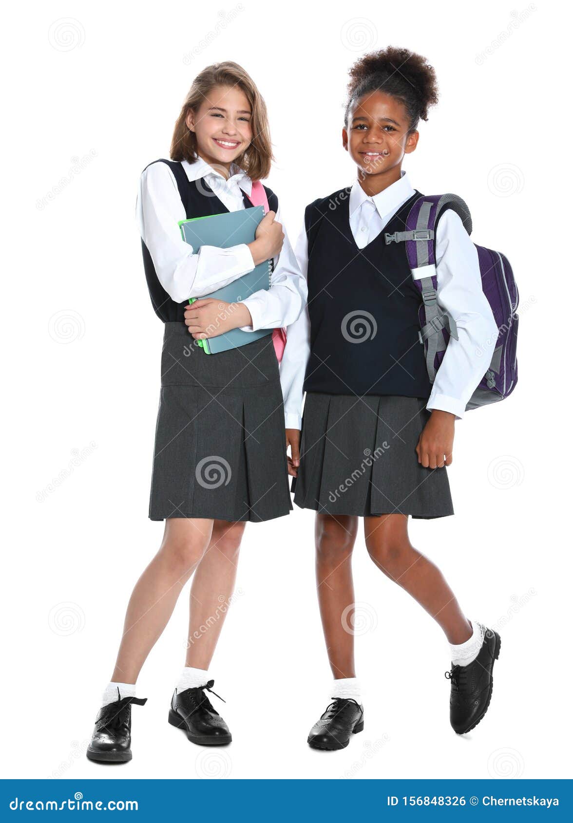 Ragazze Felici in Uniforme Scolastica Fotografia Stock - Immagine di ...