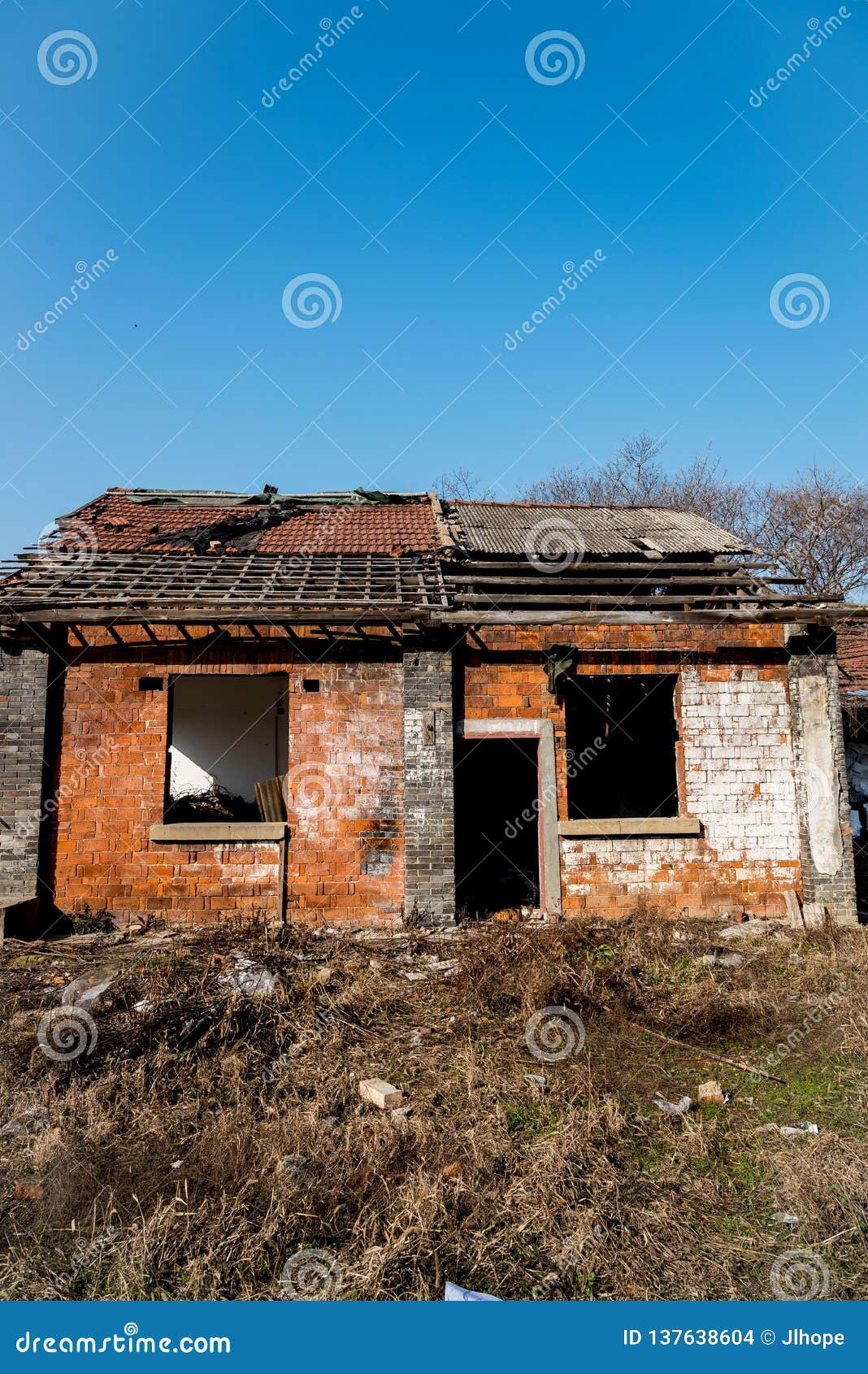 A ragged old brick house stock photo. Image of door - 137638604