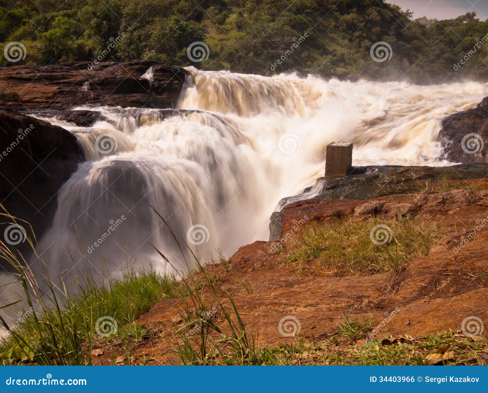 RAGING RIVER AND WATERFALL, GLACIER NATIONAL PARK Stock Photography ...