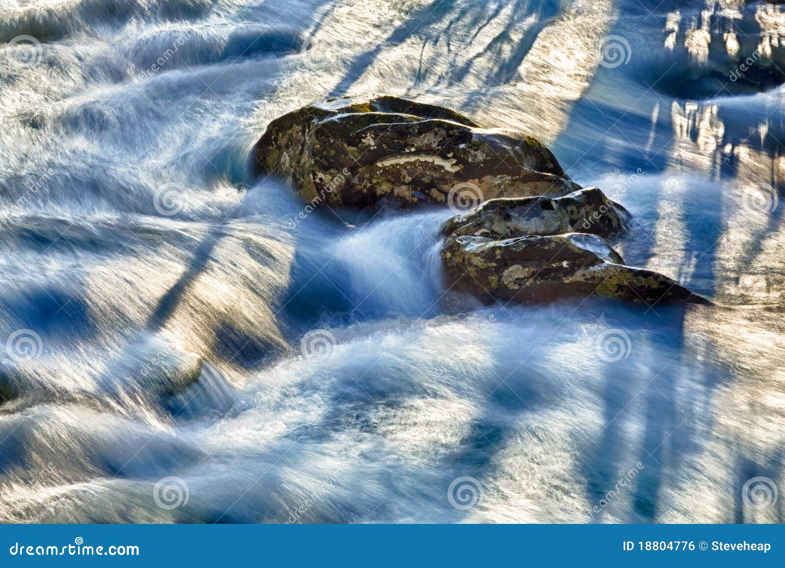 Raging River Flows Around Rocks Stock Photo - Image of mountain ...