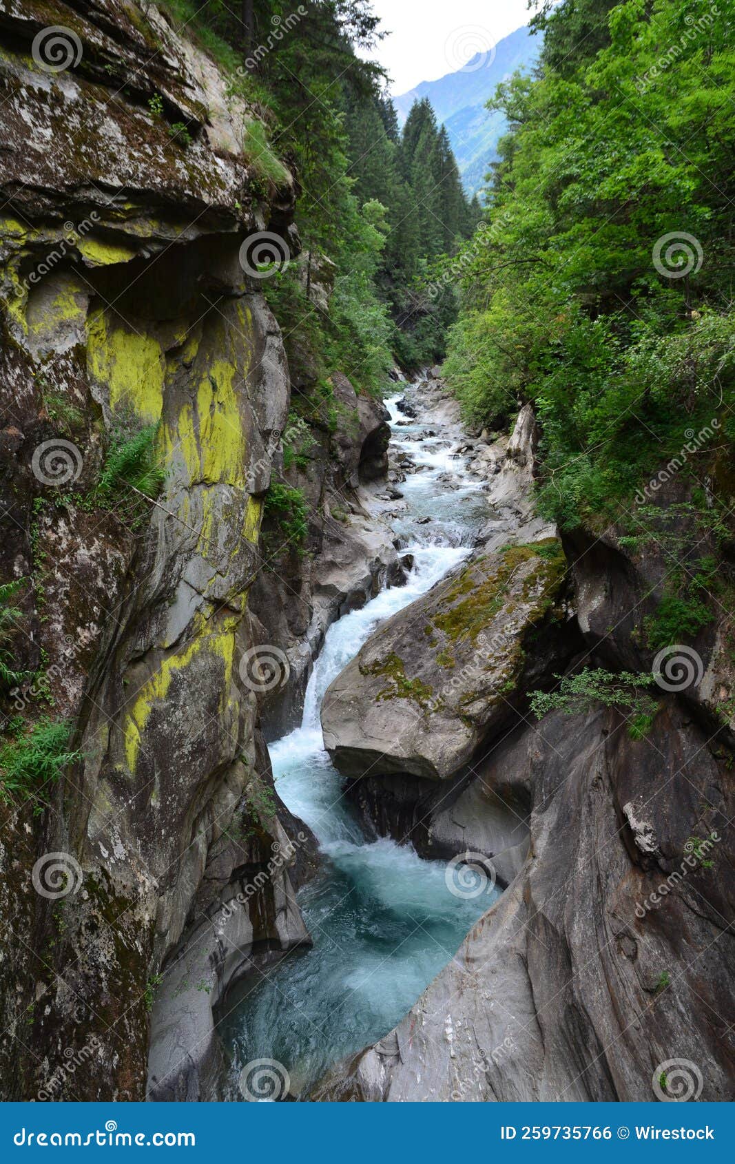 Raging River in the Middle of a Rocky Cliff Stock Photo - Image of ...