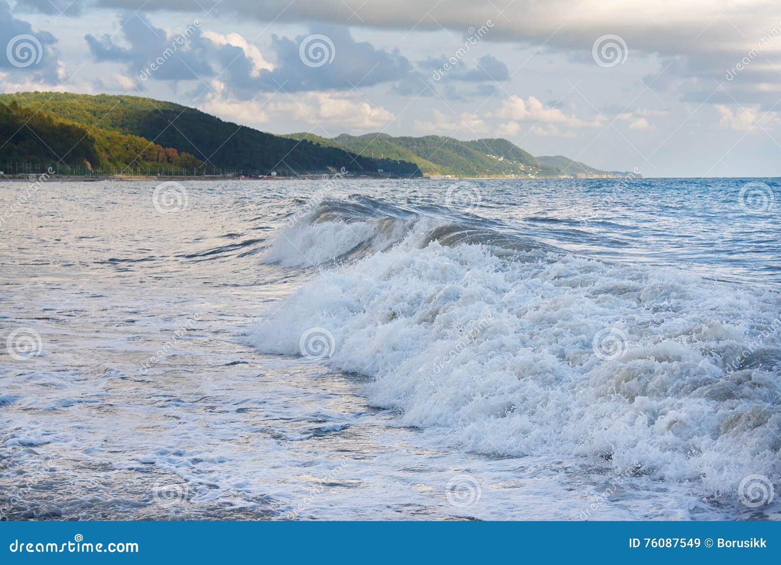 Raging Sea Waves on the Beach Against the Cloudy Sky after Storm Stock ...