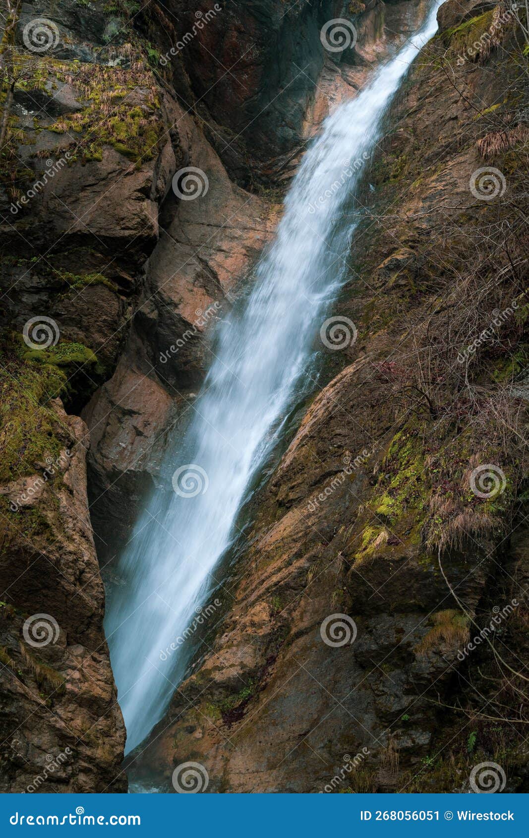 Raging Waterfall Surrounded by Rocks Stock Image - Image of tree, water ...