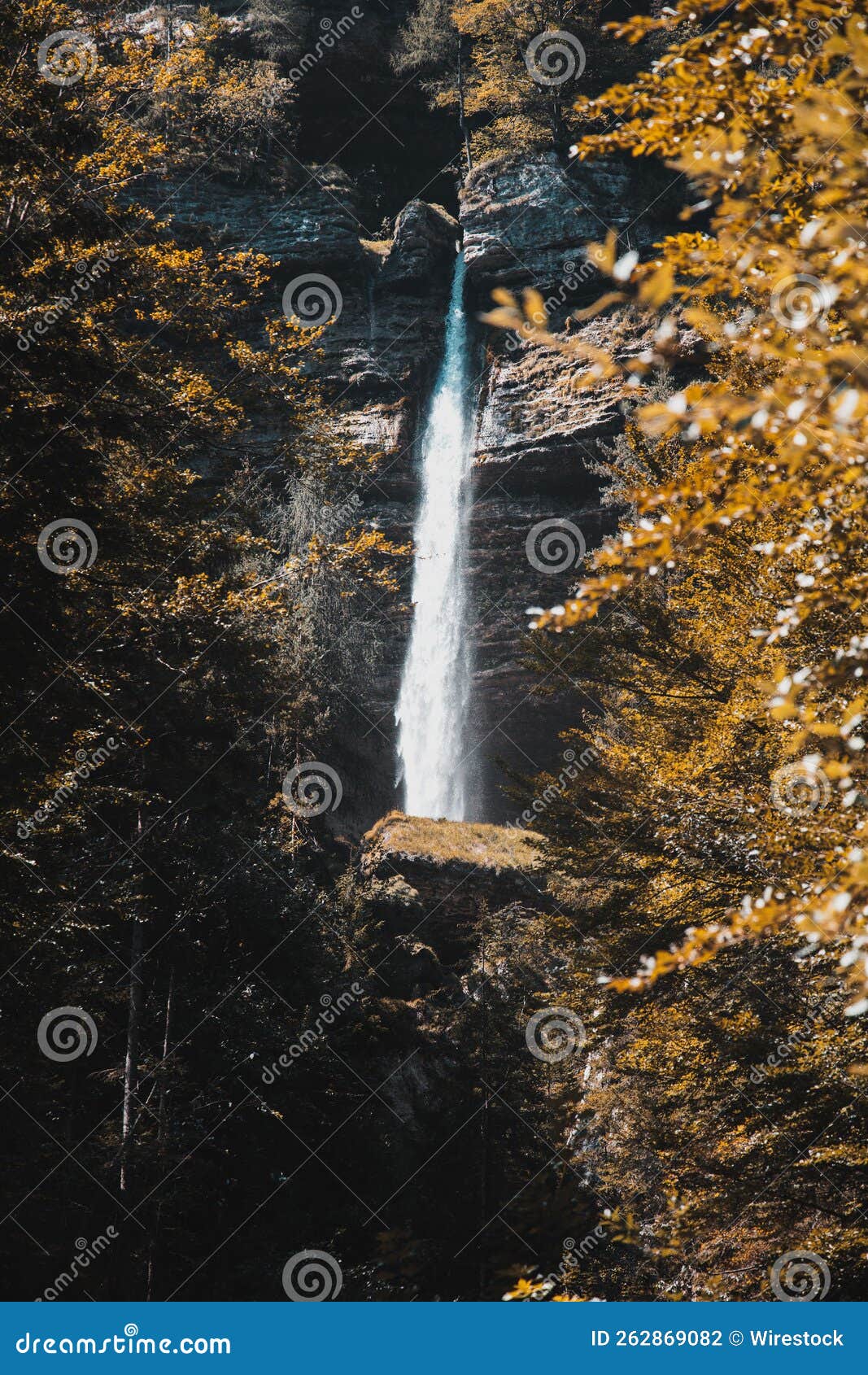 Raging Waterfall Surrounded by Trees and Rocks Stock Photo - Image of ...