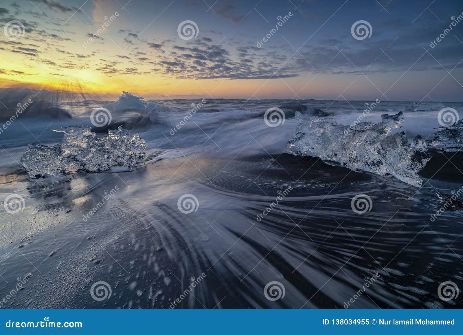 Raging Waves Smashing Ice Blocks at Sunrise on Diamond Beach Stock ...