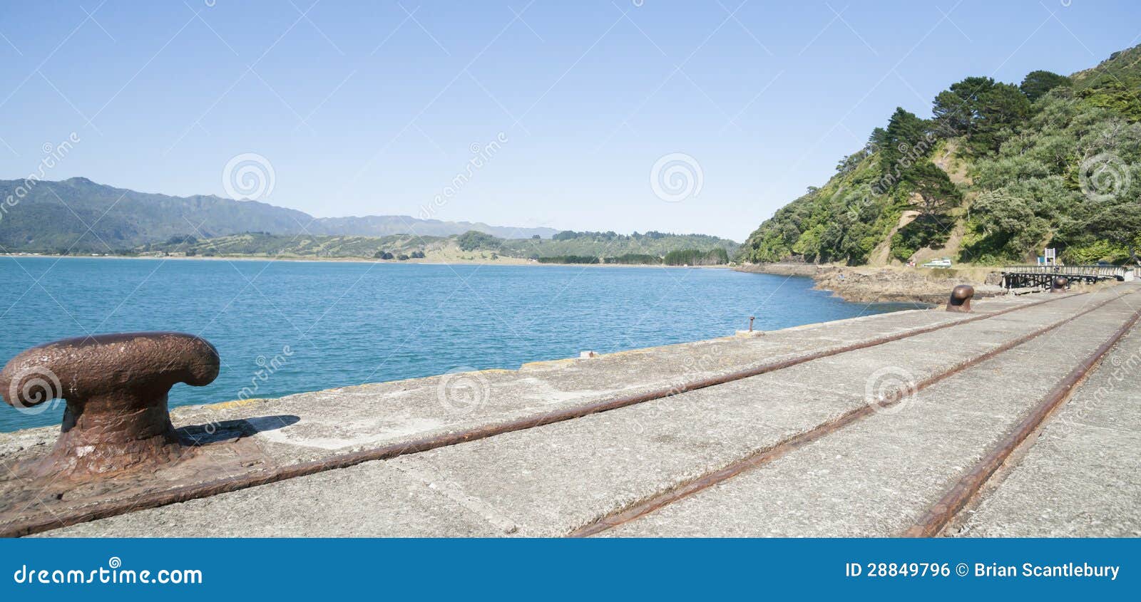 Rail Lines and Bollard on Disused Wharf. Stock Photo - Image of rail ...