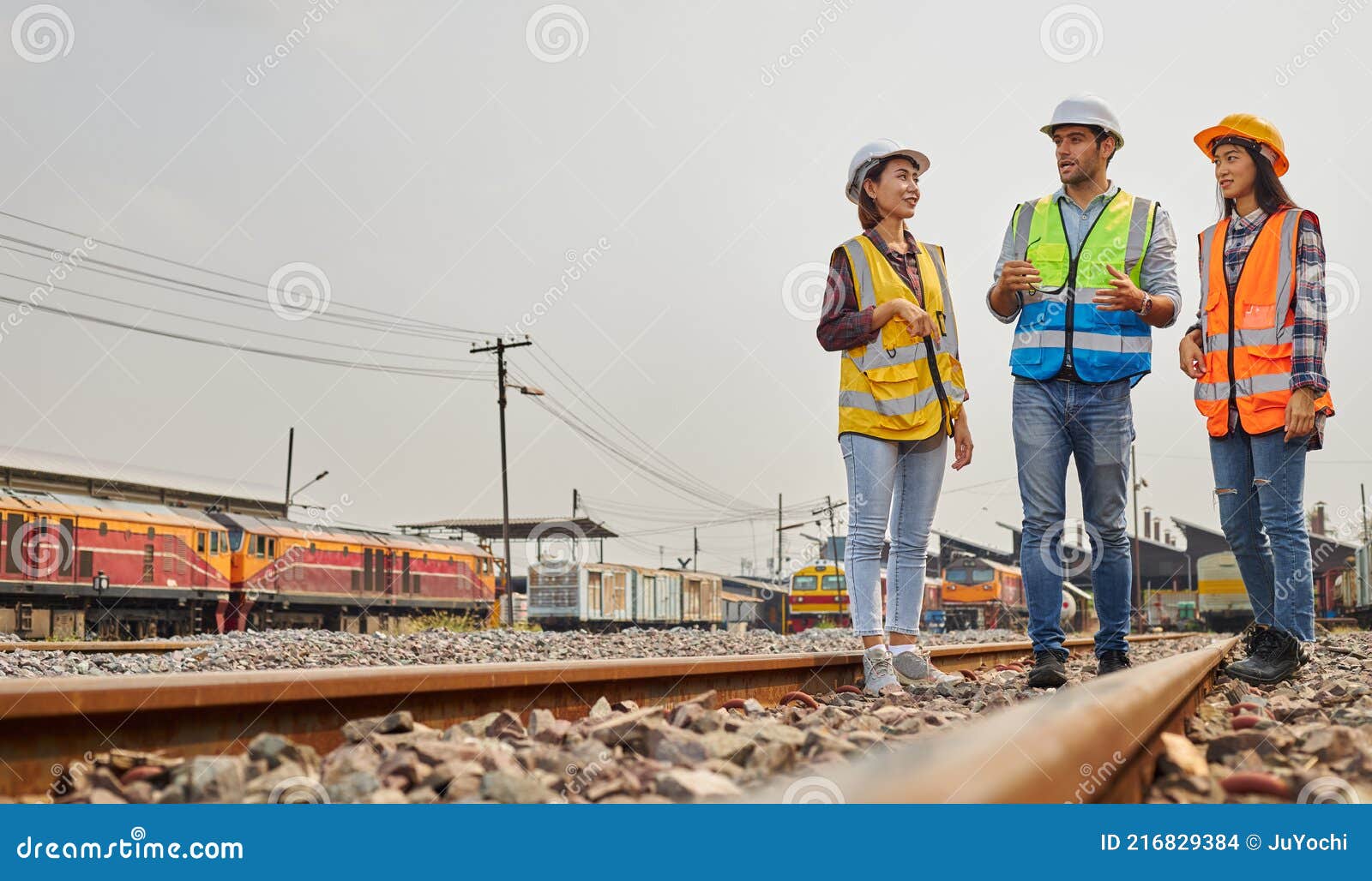 Rail Systems Industrial Workers are Working on the Train Tracks Stock ...