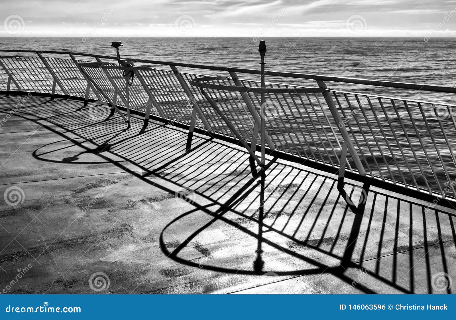 The Railing on a Cruise Ship Throws Long Shadows Stock Photo - Image of ...