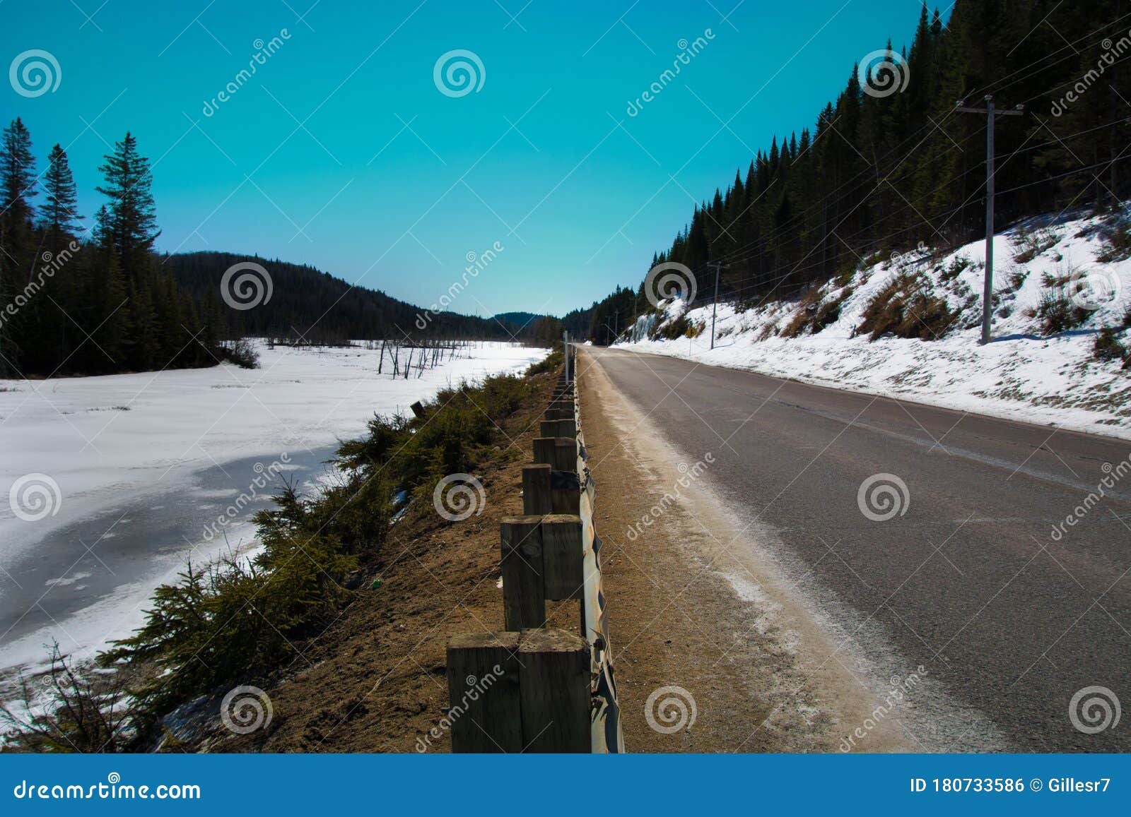 Railing Separating the Road from a Lake Stock Photo - Image of road ...