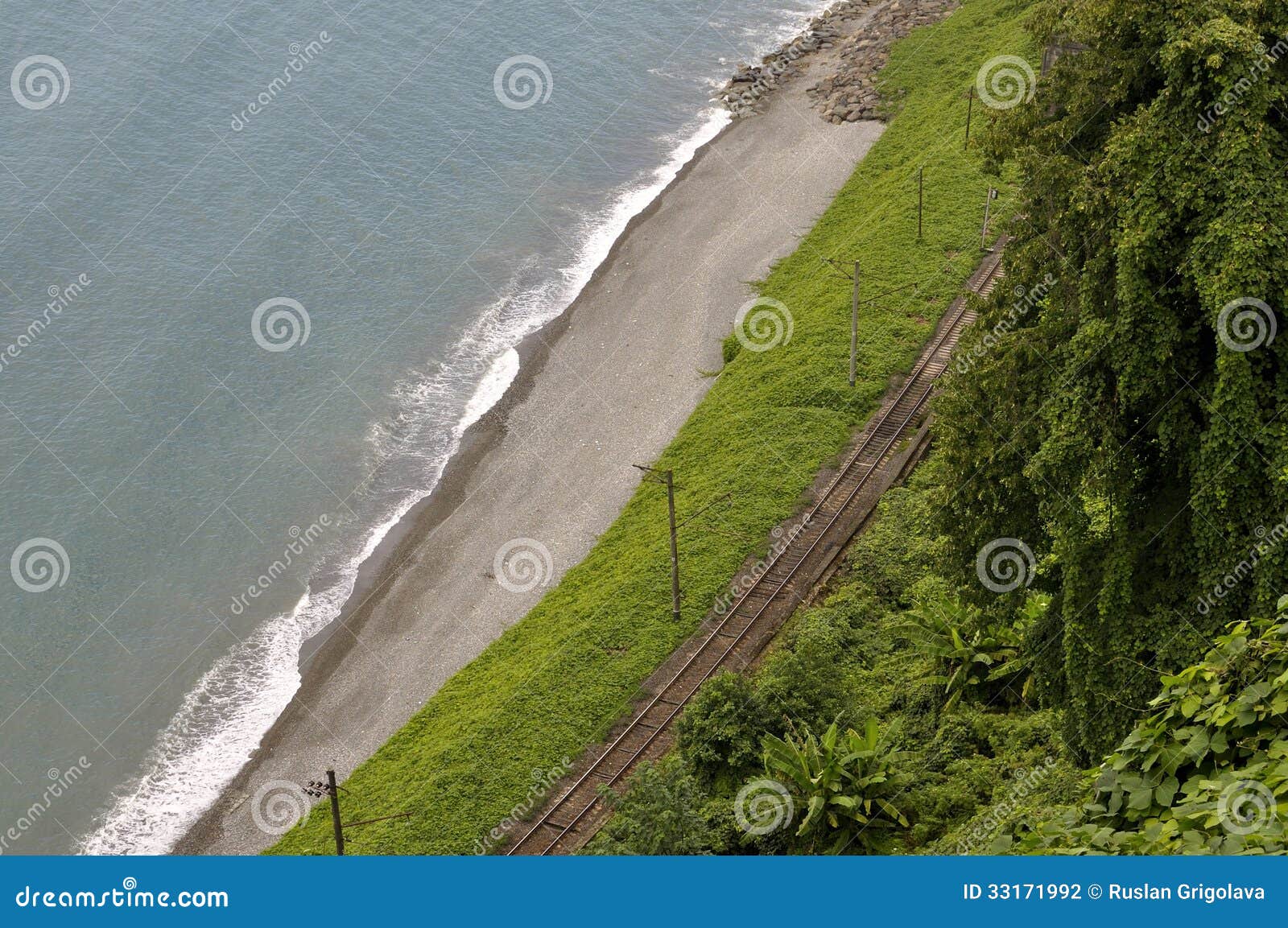 Railroad on the beach stock photo. Image of tree, railroad - 33171992
