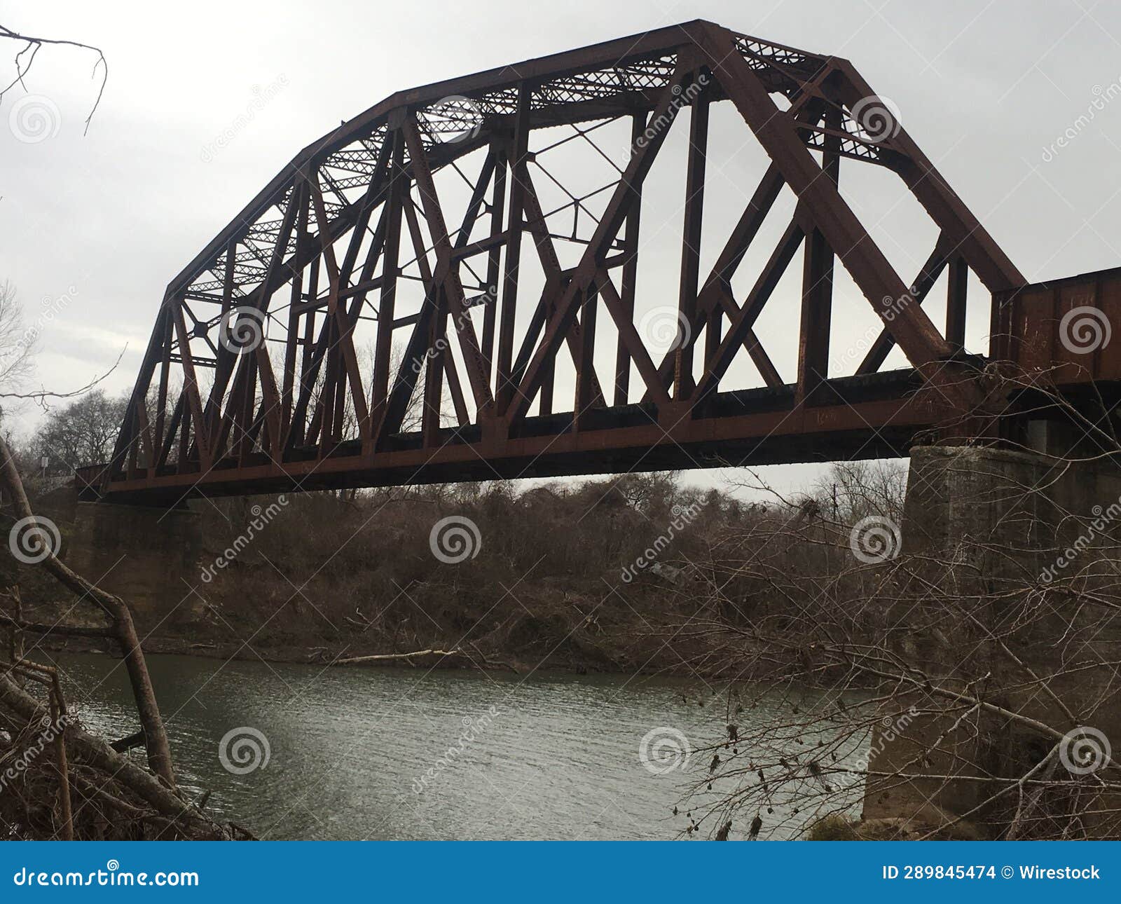 The Railroad Bridge Over the River is Spanning Two Sides of the River ...