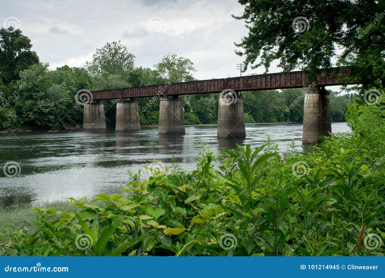 Railroad Bridge Across River Stock Image - Image of river, pillars ...