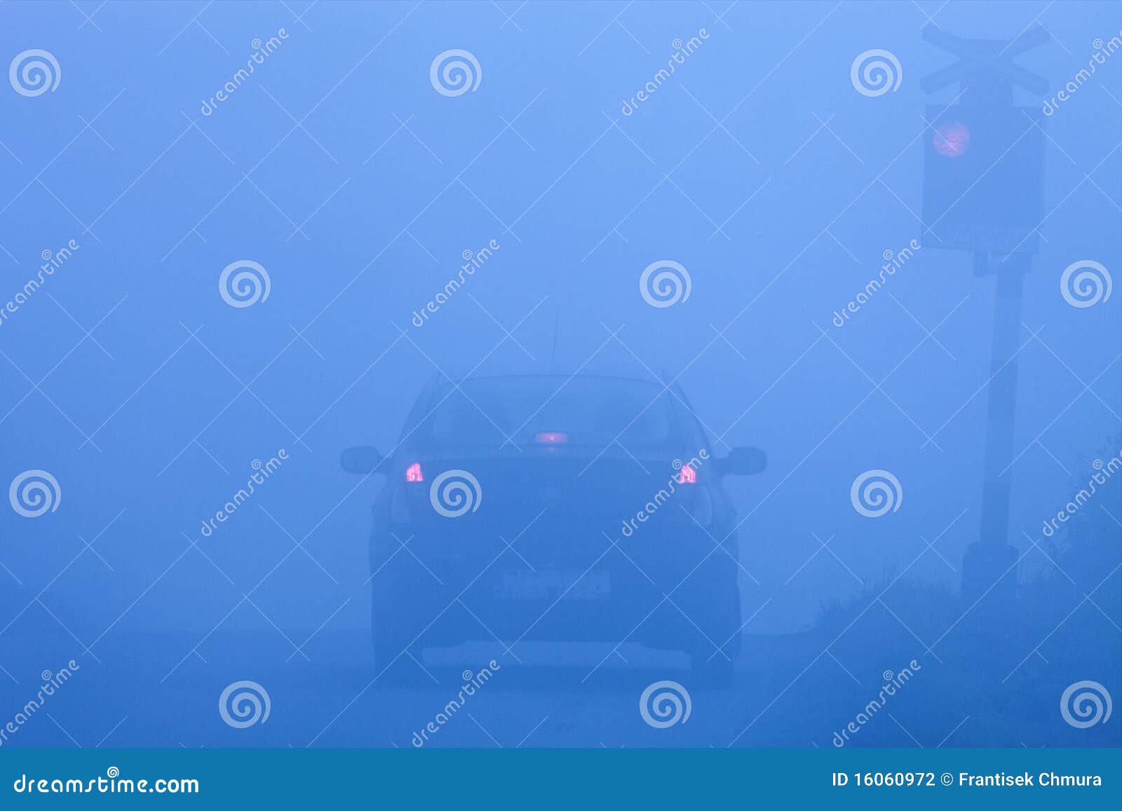 Railroad crossing in fog stock photo. Image of danger - 16060972