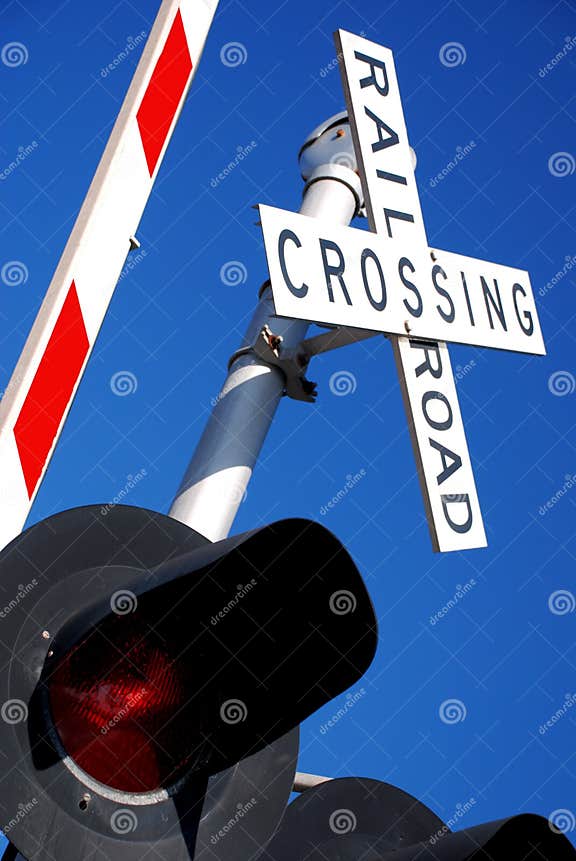 Railroad Crossing Guard and Lights Stock Photo - Image of post ...