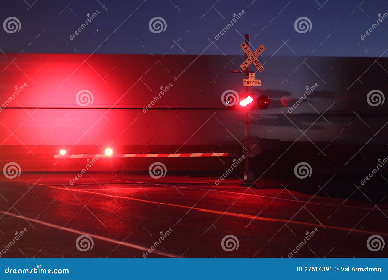 Railroad Crossing at Night stock image. Image of asphalt - 27614391