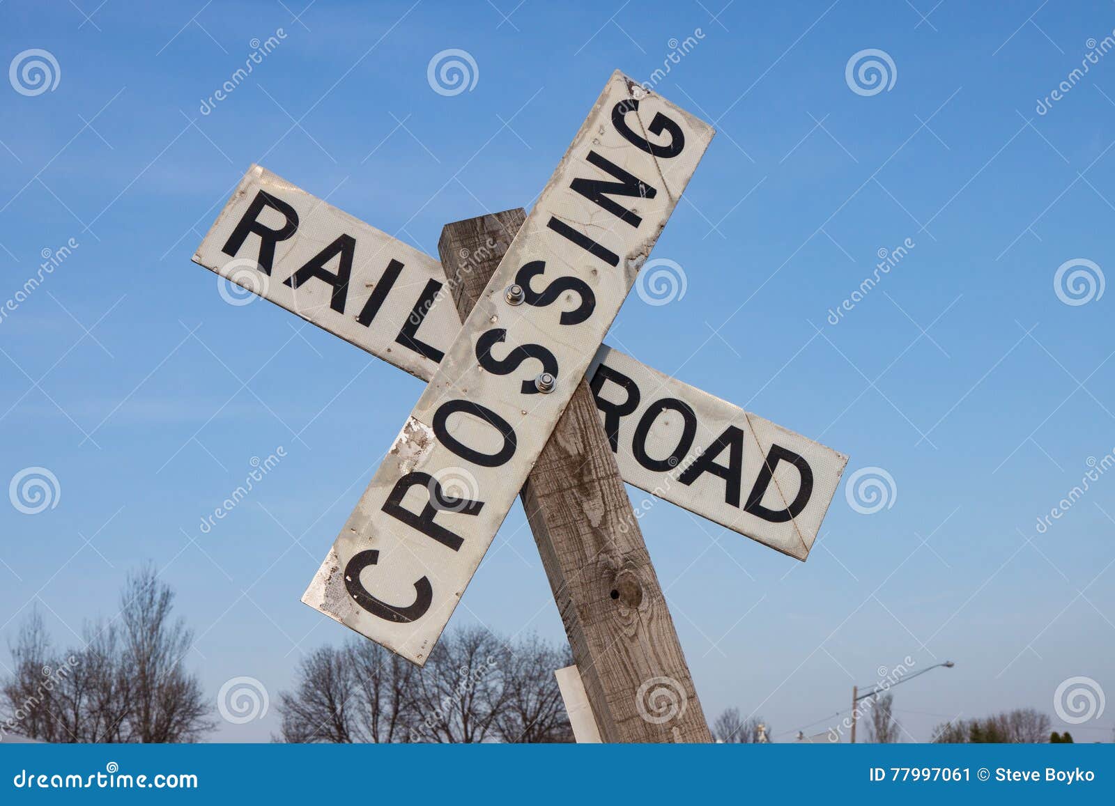 Railroad Crossing Sign Against Blue Sky Stock Image - Image of warning ...
