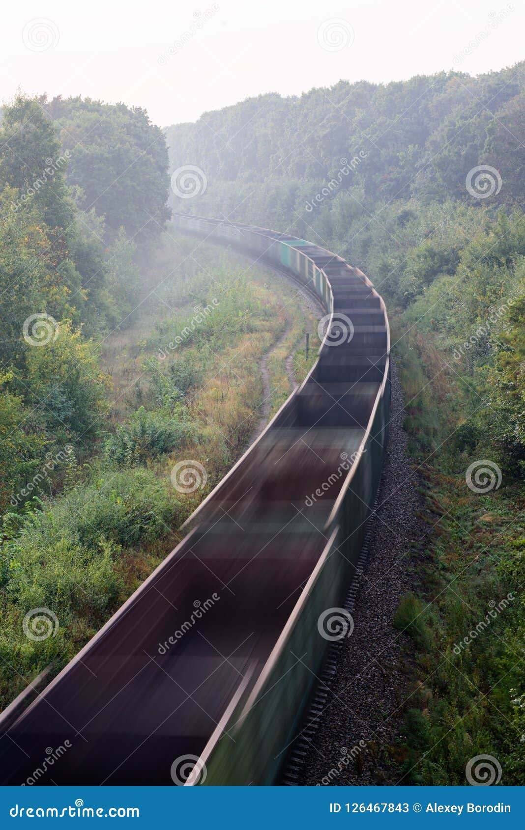 Railroad Landscape. Empty Freight Train Going at Full Speed among Green ...