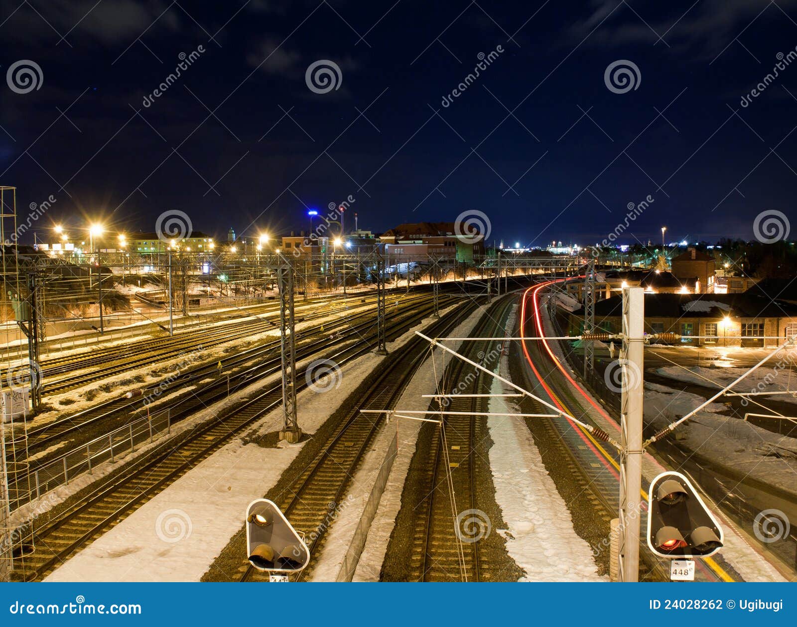 Railroad at night stock photo. Image of city, tracks - 24028262