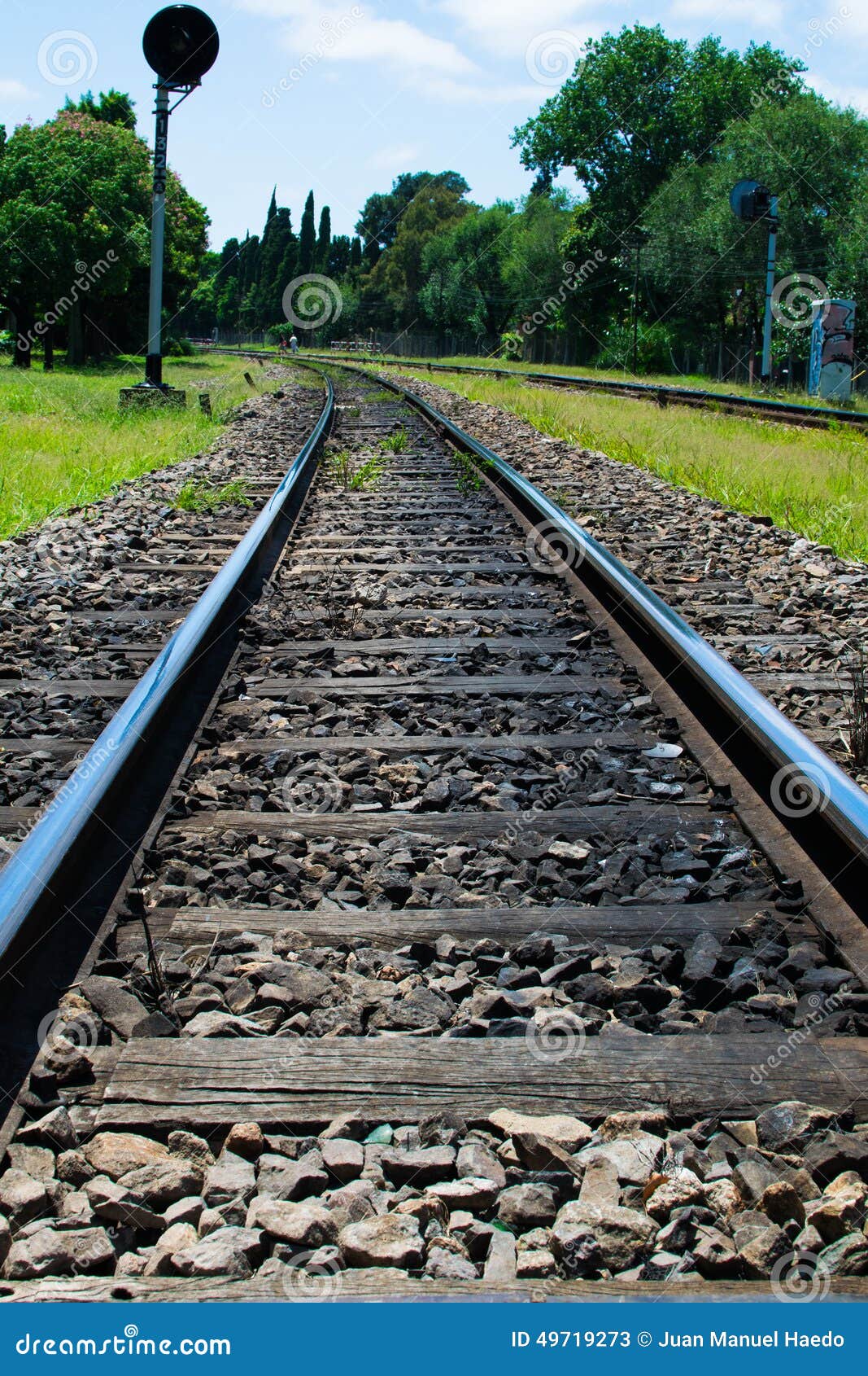 Railroad with Sign on a Green Field Stock Image - Image of left, rail ...