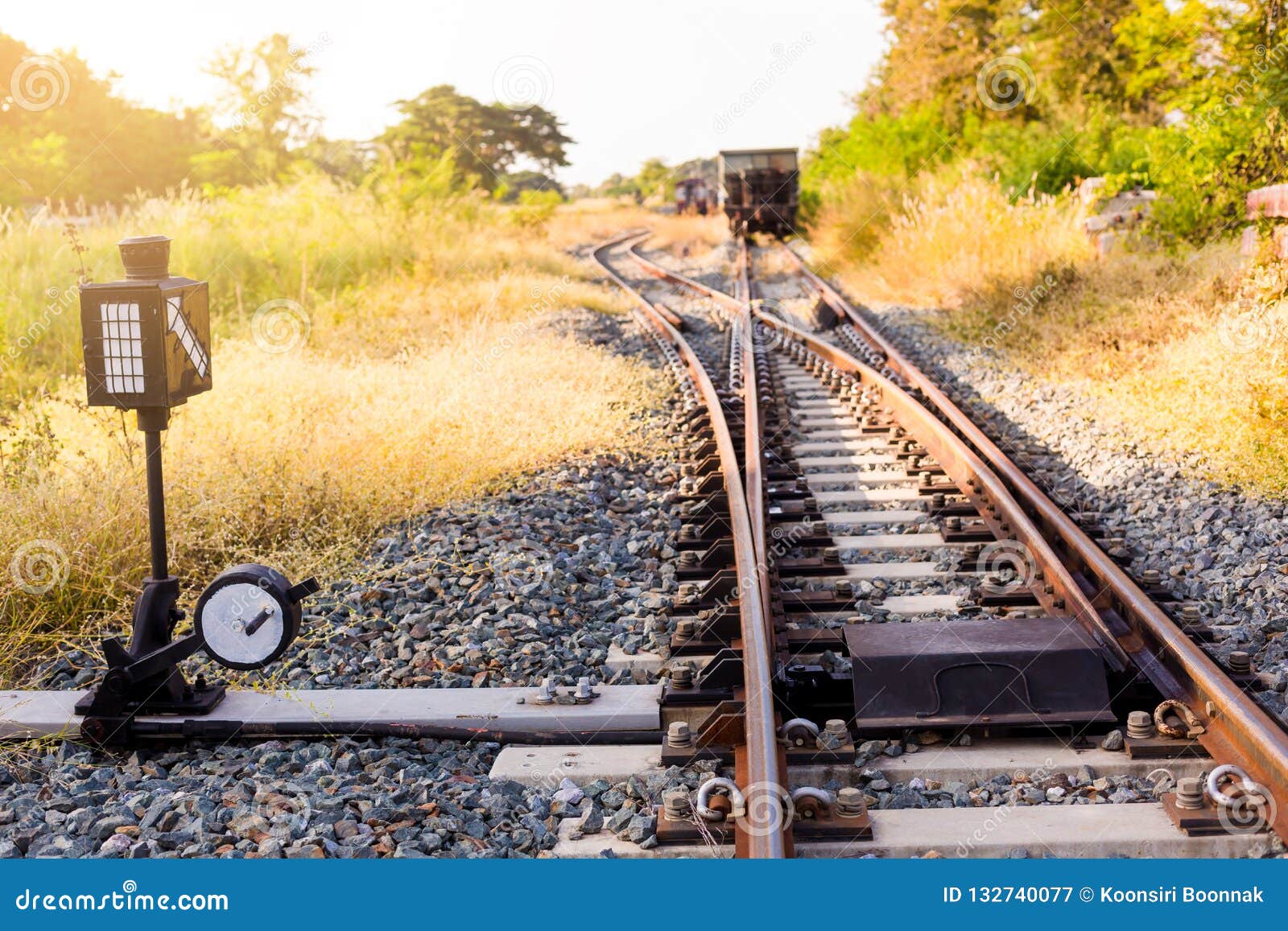 Railroad Switch with Train in the Morning Sun. the Conception of Stock ...