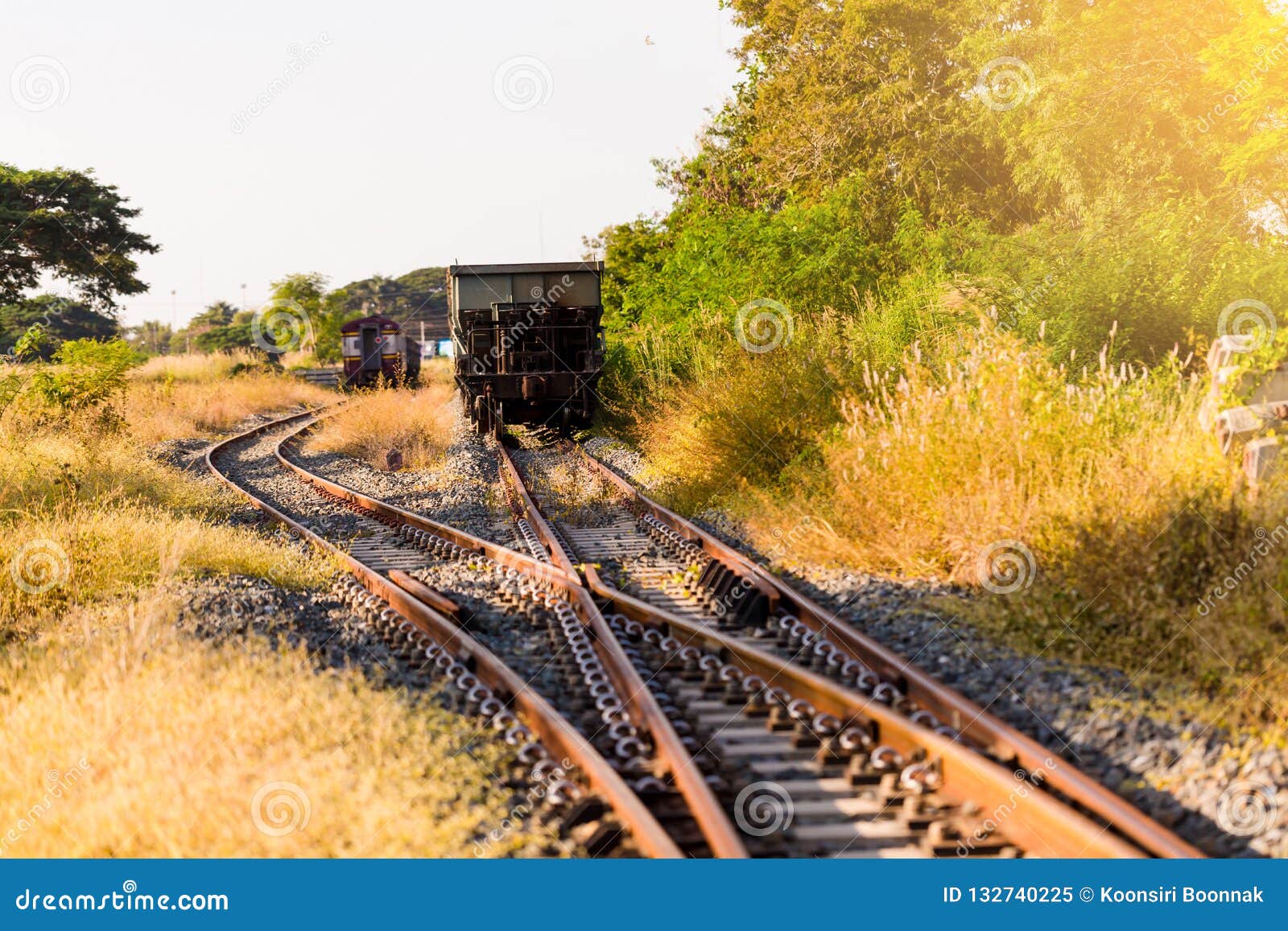 Railroad Switch with Train in the Morning Sun. the Conception of Stock ...