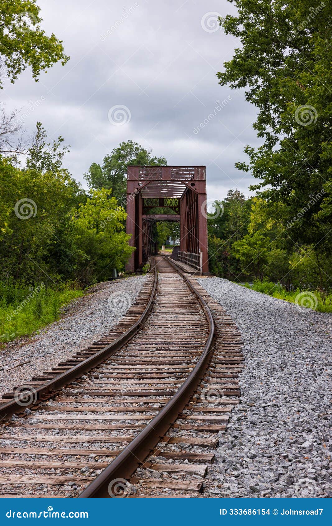A Railroad Track Crossing Old Railroad Bridge Stock Photo - Image of ...