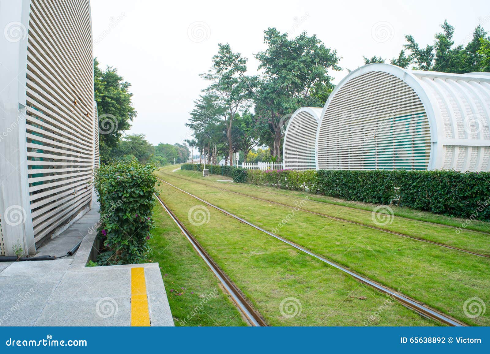 Railroad track with grass stock photo. Image of ground - 65638892