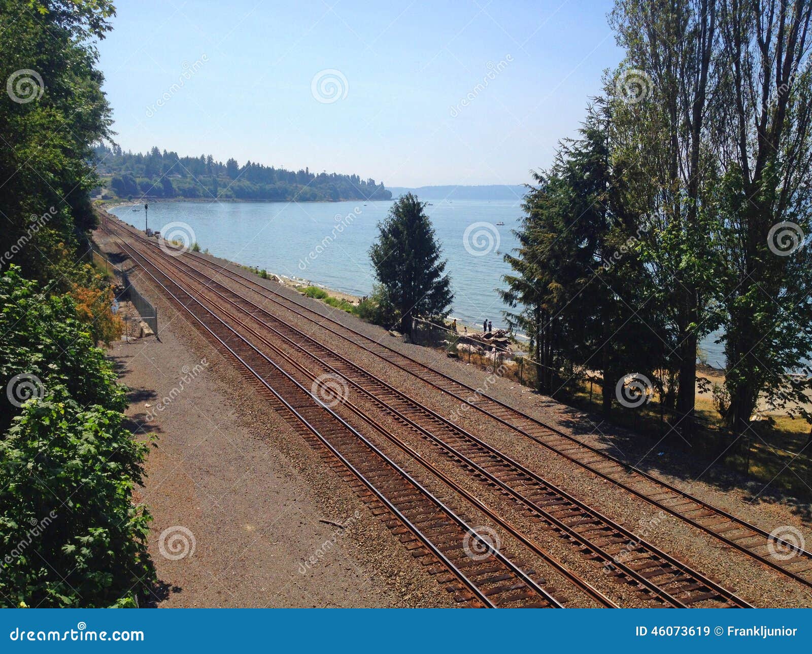 Railroad Tracks Along an Ocean Bay Stock Image - Image of everett ...