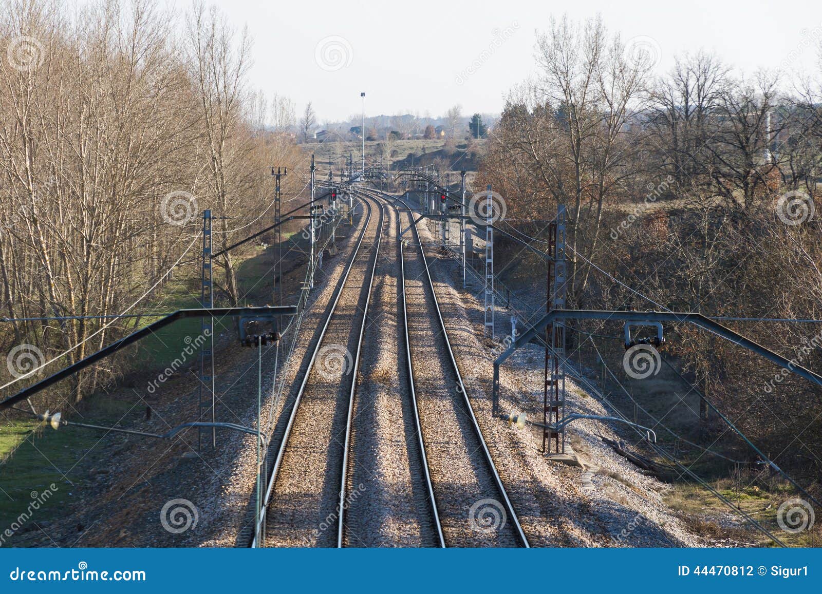Railroad Tracks and Catenary Stock Photo - Image of industrial, earth ...