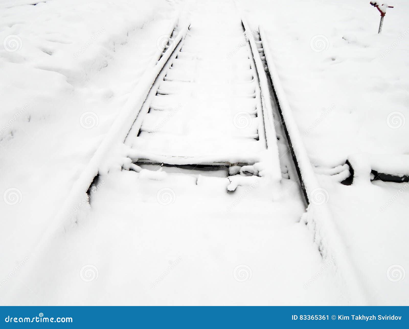 Railroad Tracks Covered with Snow after a Snowfall Stock Image - Image ...