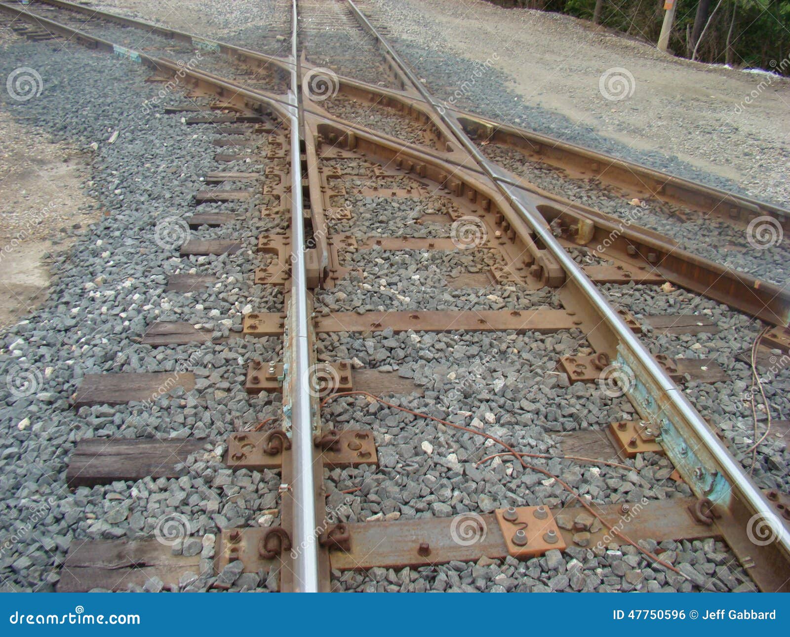 Railroad tracks crossing stock photo. Image of town, change - 47750596