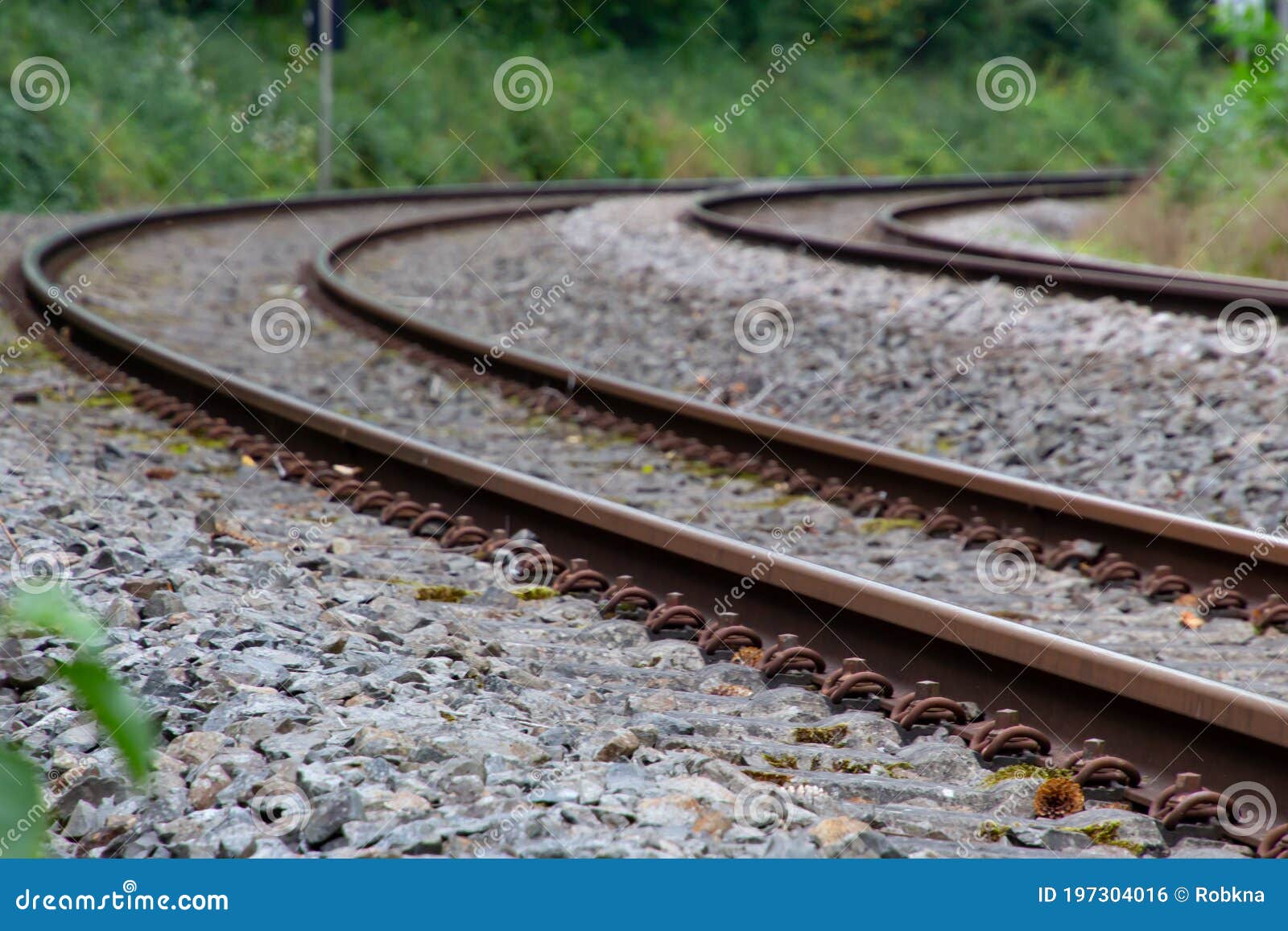 Railroad tracks in a curve stock photo. Image of railway - 197304016